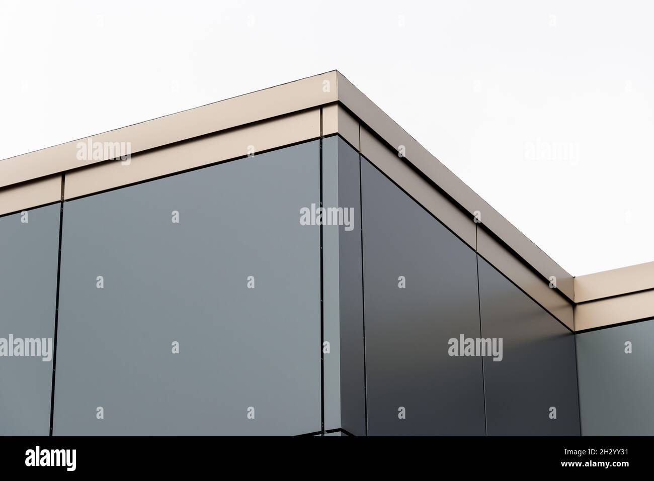 The exterior wall of a contemporary commercial style building with ...