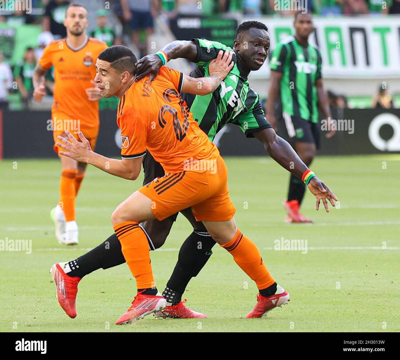 October 24, 2021: Austin FC forward Moussa Djitte (99) fends off ...