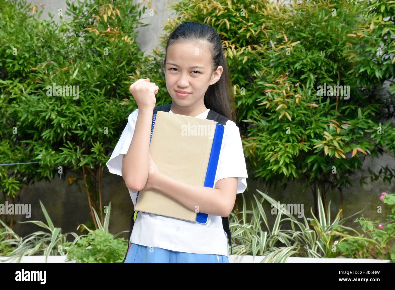 Mad Diverse Girl Student Wearing Uniform Stock Photo - Alamy