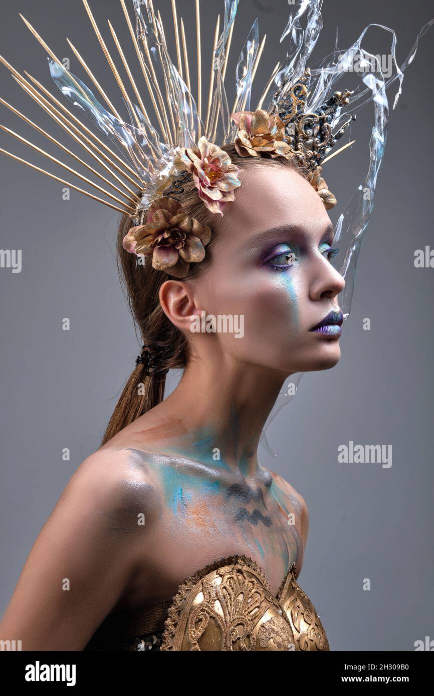Girl in the form of Aquarius Stock Photo - Alamy