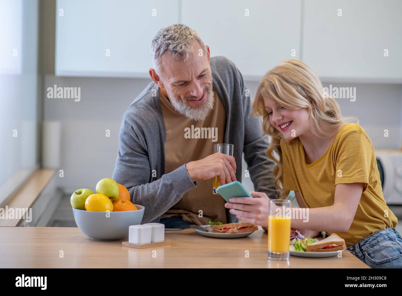 Dad making breakfast for his daughter Stock Photo - Alamy