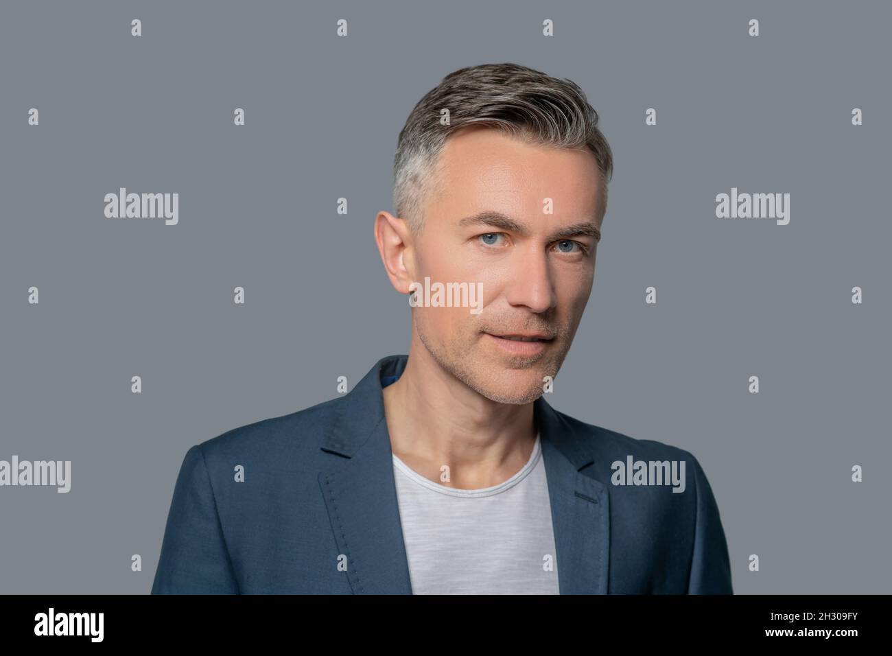 Positive good looking mature hi-res stock photography and images - Alamy