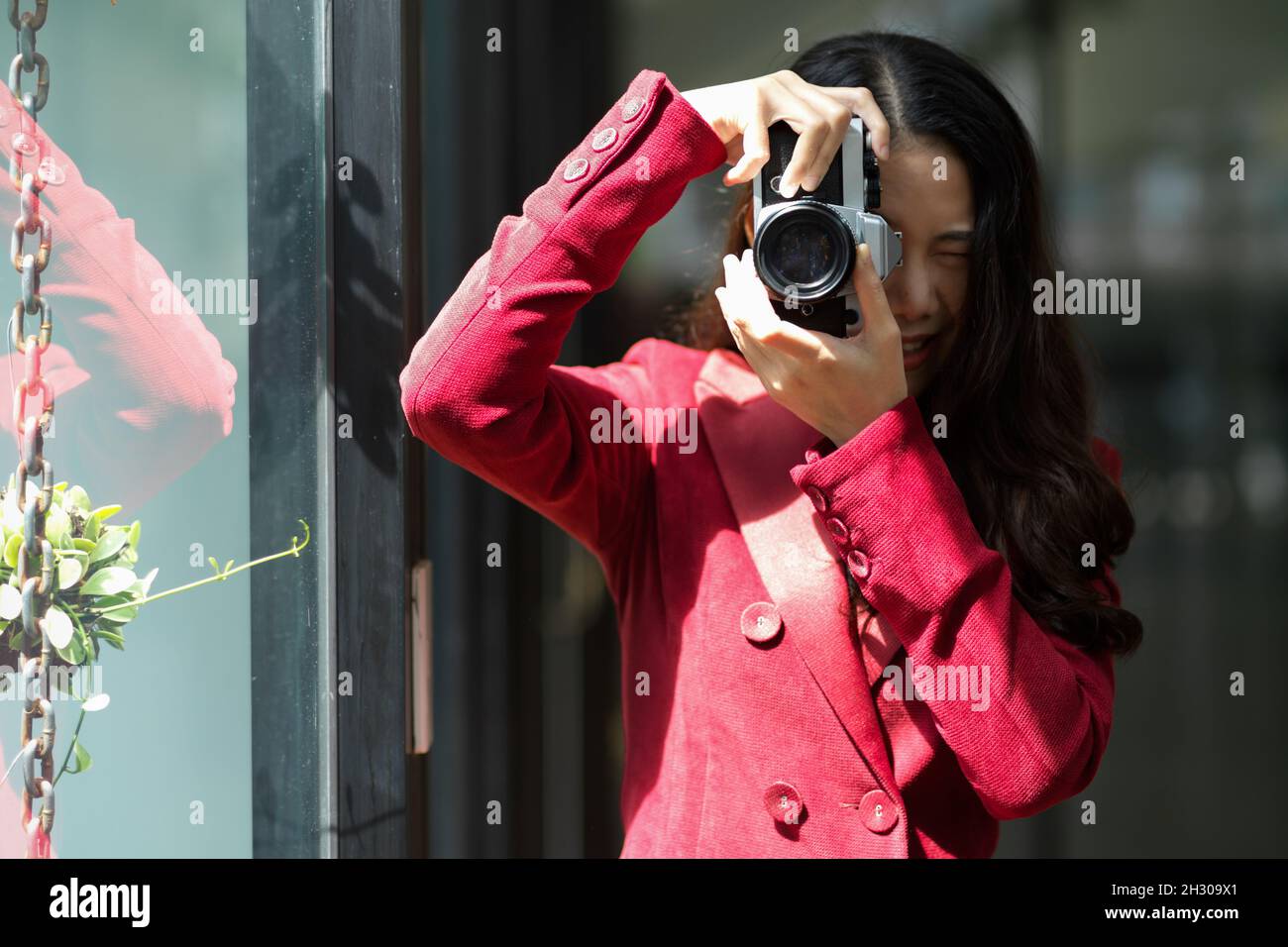 Beautiful millennial girl in red hi-res stock photography and images - Alamy