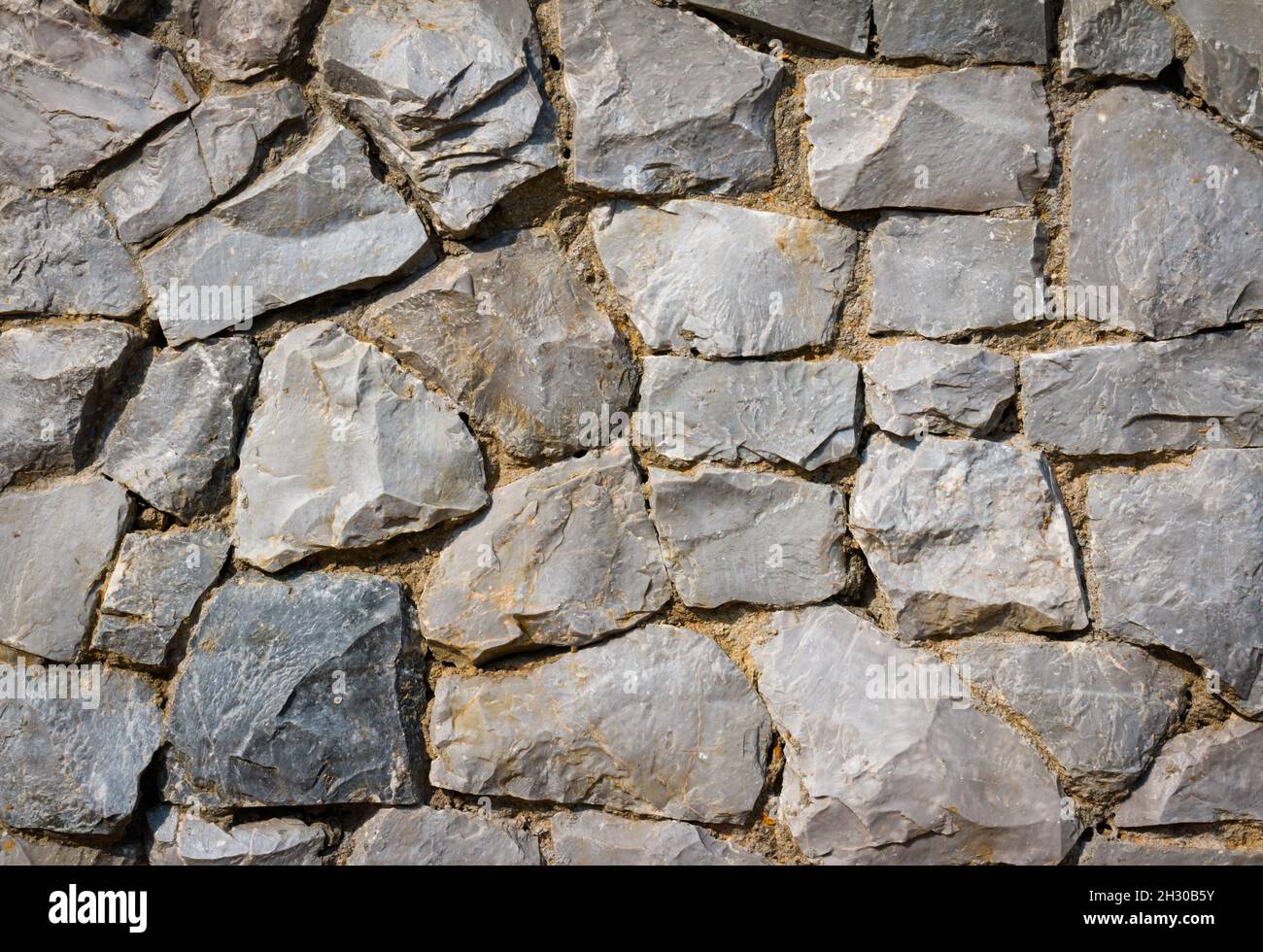 Gray stone wall background hi-res stock photography and images - Alamy