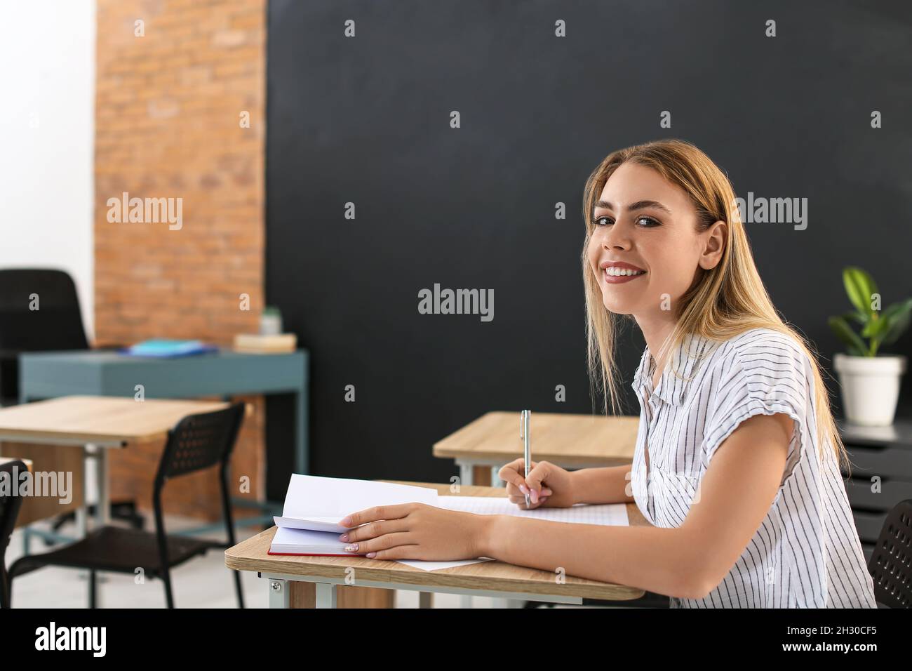 Student passing exam at school Stock Photo - Alamy