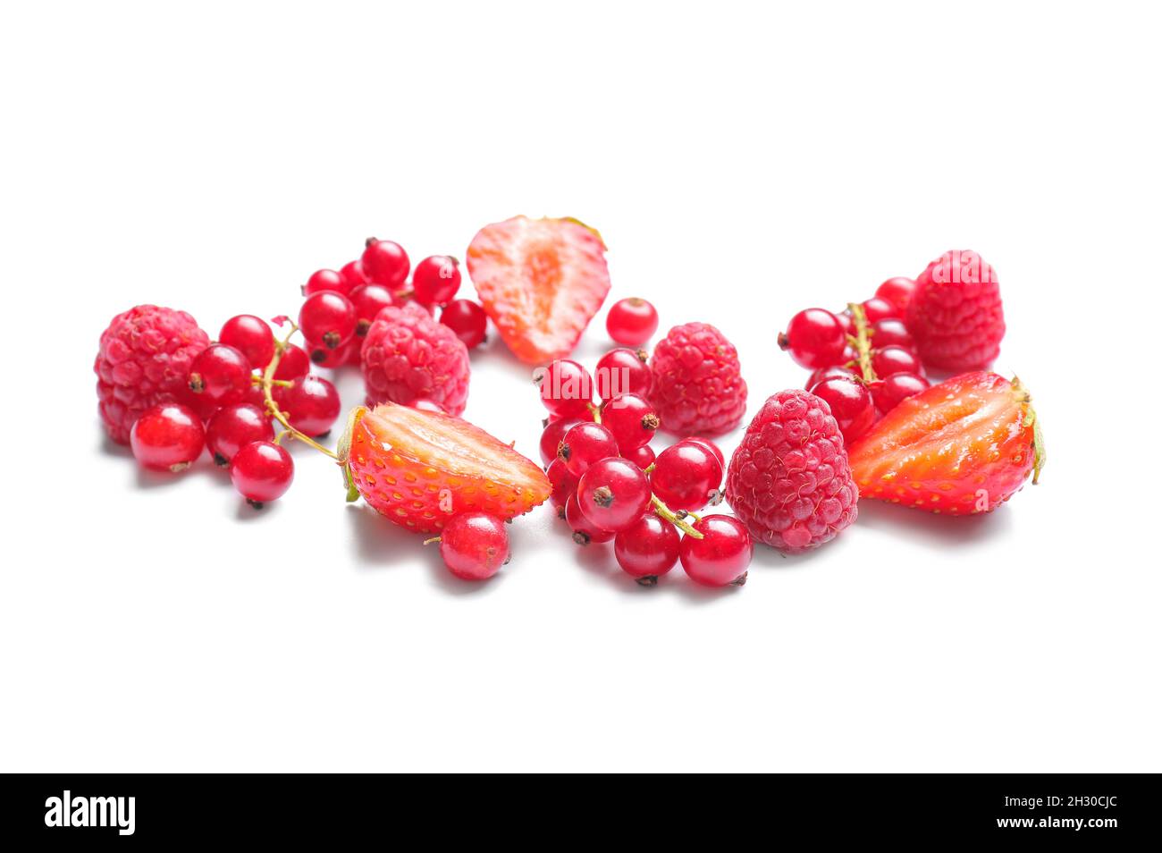 Tasty different berries on white background Stock Photo - Alamy