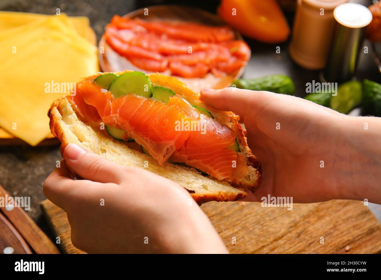 Woman stuffing fish vegetables preparing hi-res stock photography and ...