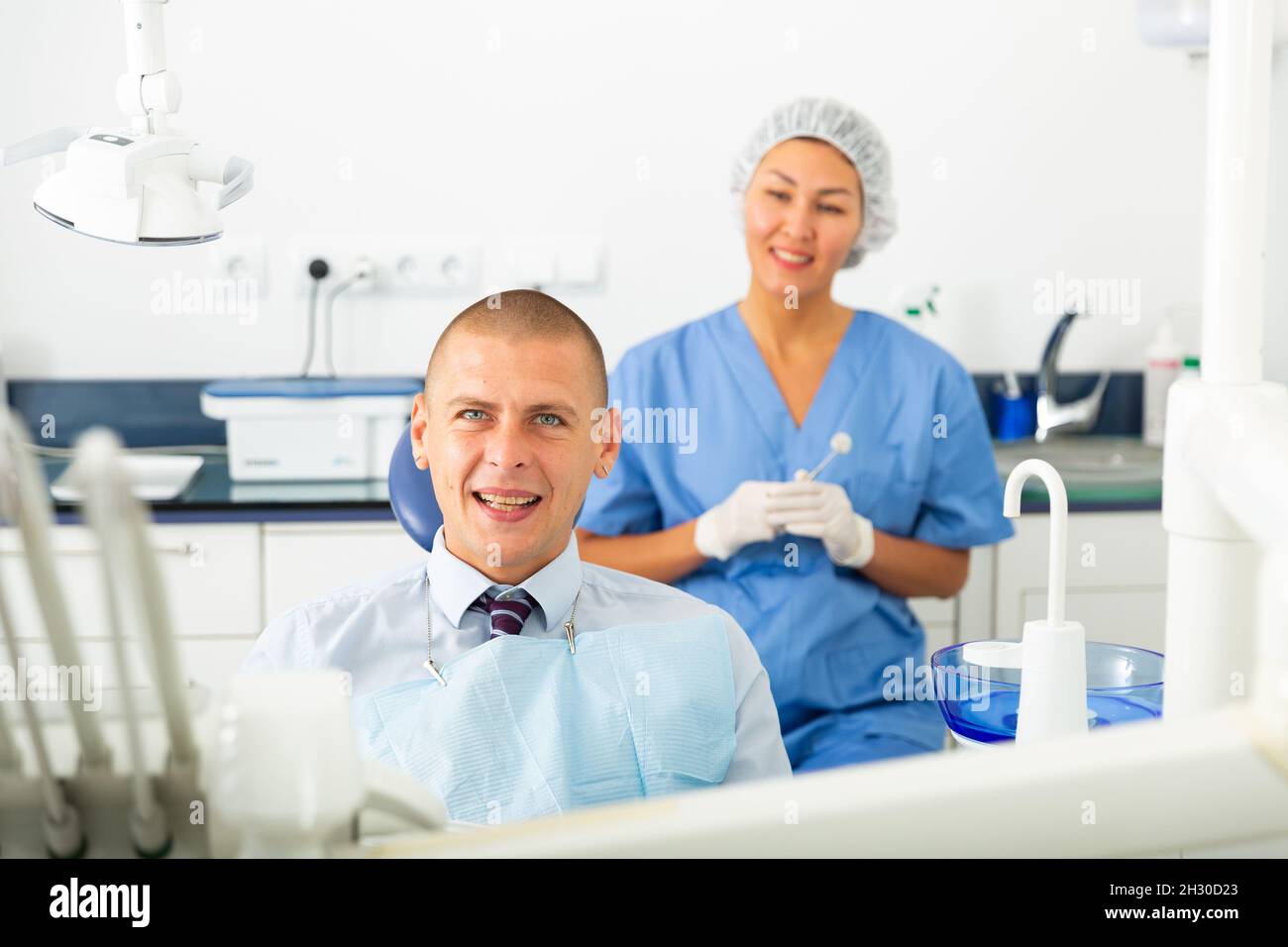 Portrait of happy man after surgery at dental blade Stock Photo - Alamy