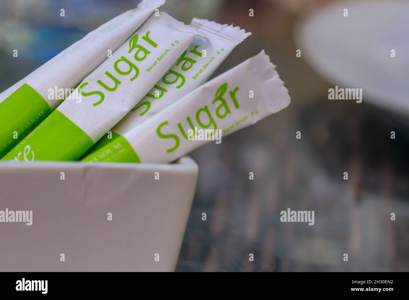 Premium granulated sugar from sugar cane for sweetening is served at ...
