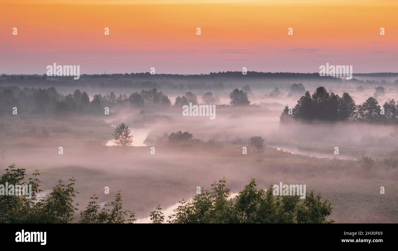 Amazing Sunrise Over Misty Landscape. Scenic View Of Foggy Morning Sky ...