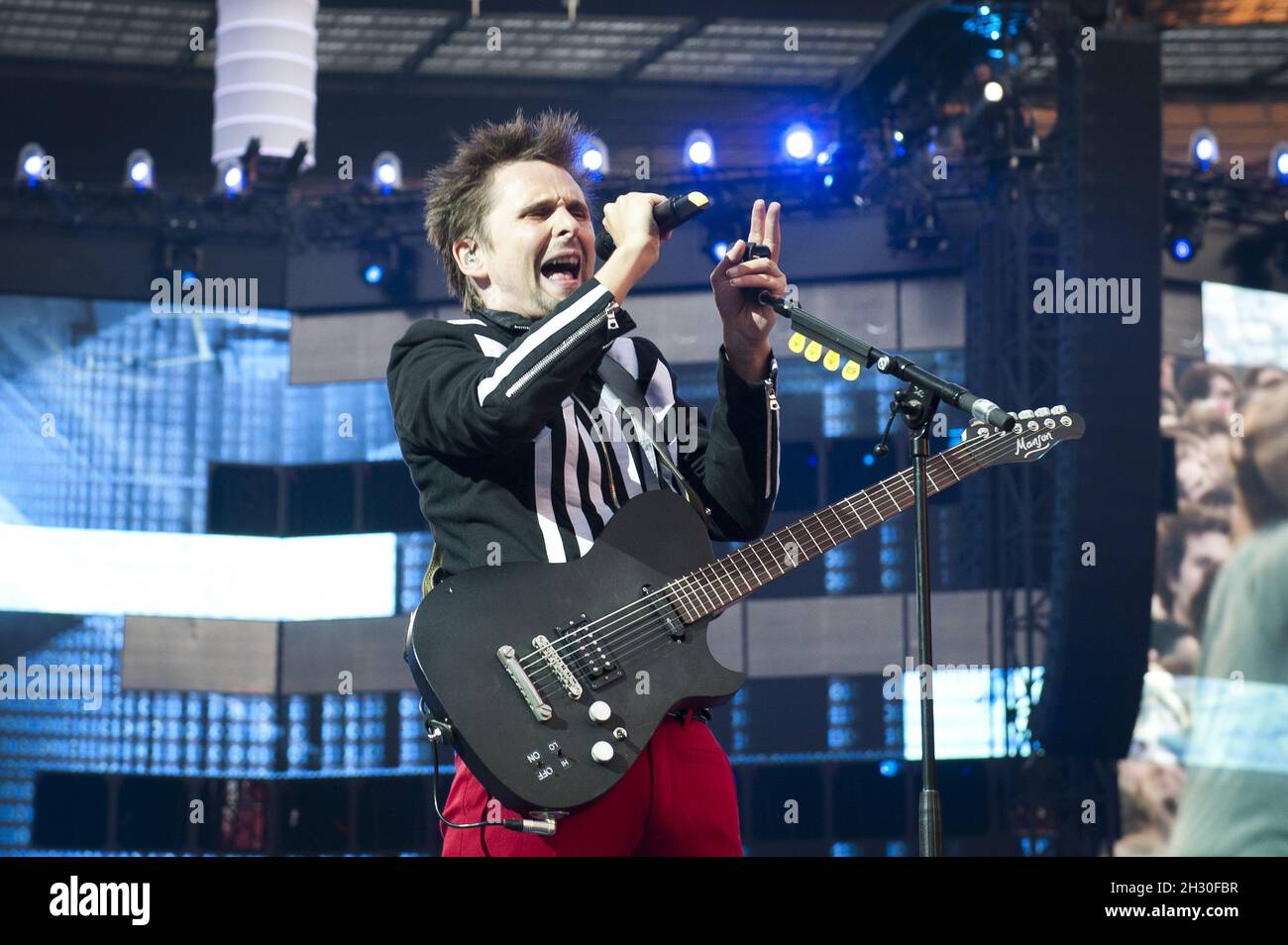 Matt Bellamy from MUSE plays live on stage at The Emirates Stadium ...