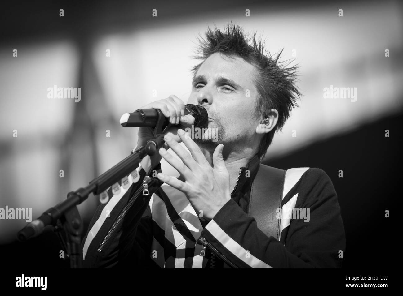Matt Bellamy from MUSE plays live on stage at The Emirates Stadium ...