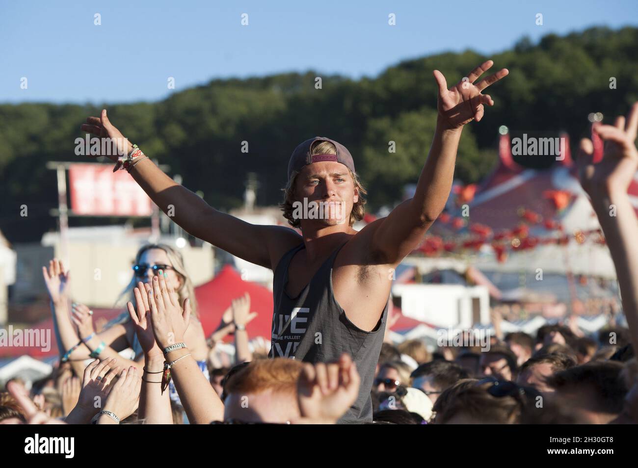 Festival goer in the main stage audience on Day 2 of Bestival, Robin ...