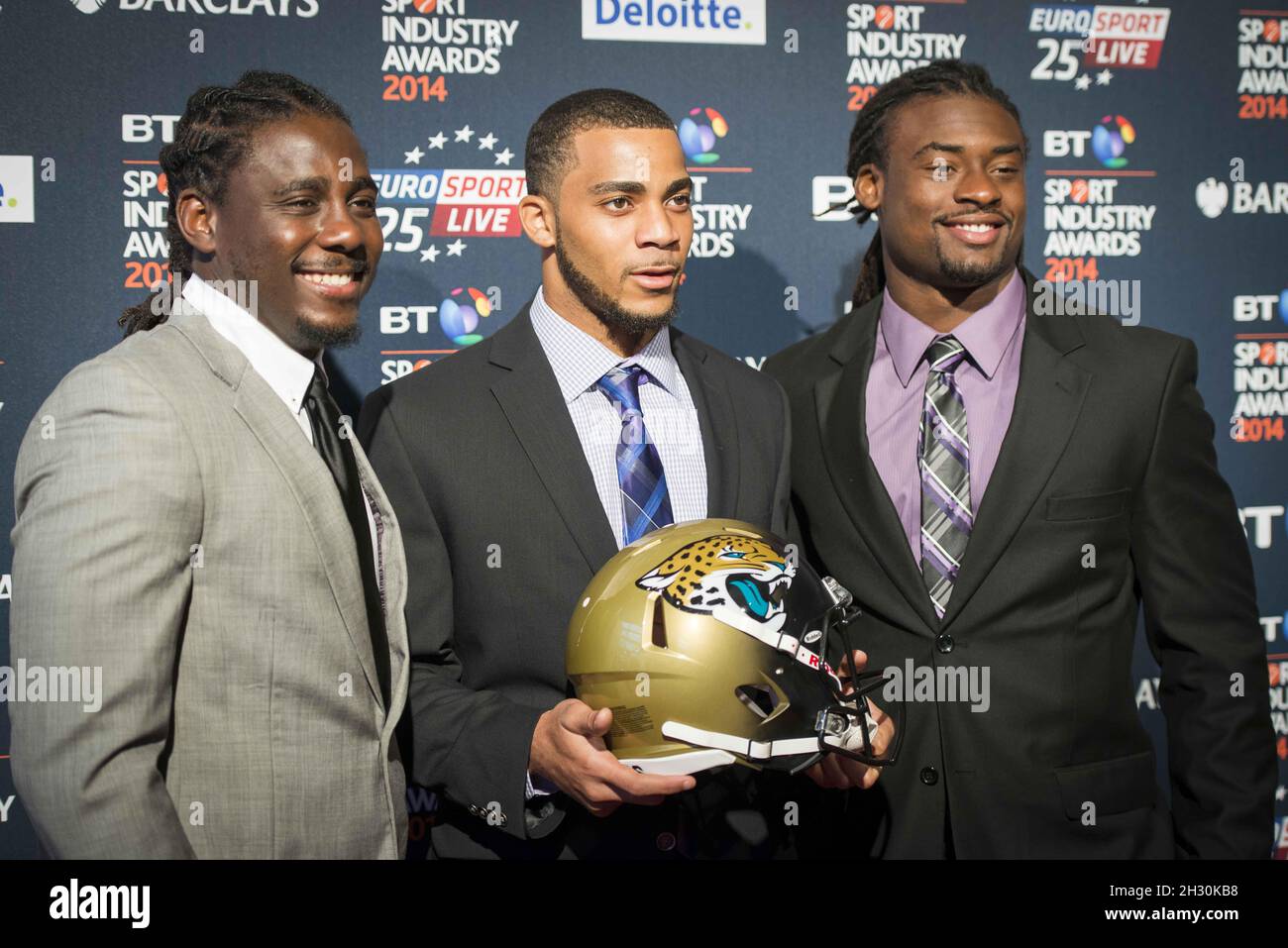 Denard Robinson Dwayne Gratz and Jonathan Cyprien of the Jacksonville ...
