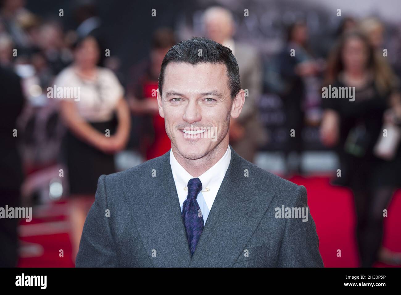 Luke Evans arrives at the Dracula Untold premiere at the Odeon ...
