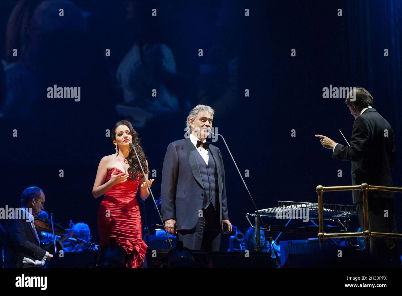 Soprano Maria Aleida joins Andrea Bocelli on stage at the O2 Arena in ...