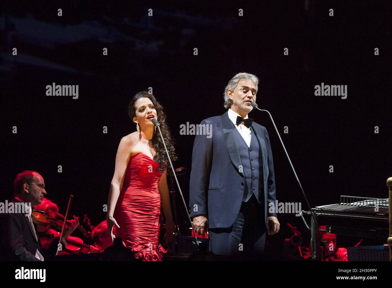 Soprano Maria Aleida joins Andrea Bocelli on stage at the O2 Arena in ...