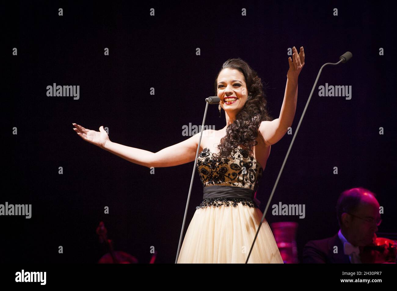 Soprano Maria Aleida joins Andrea Bocelli on stage at the O2 Arena in ...