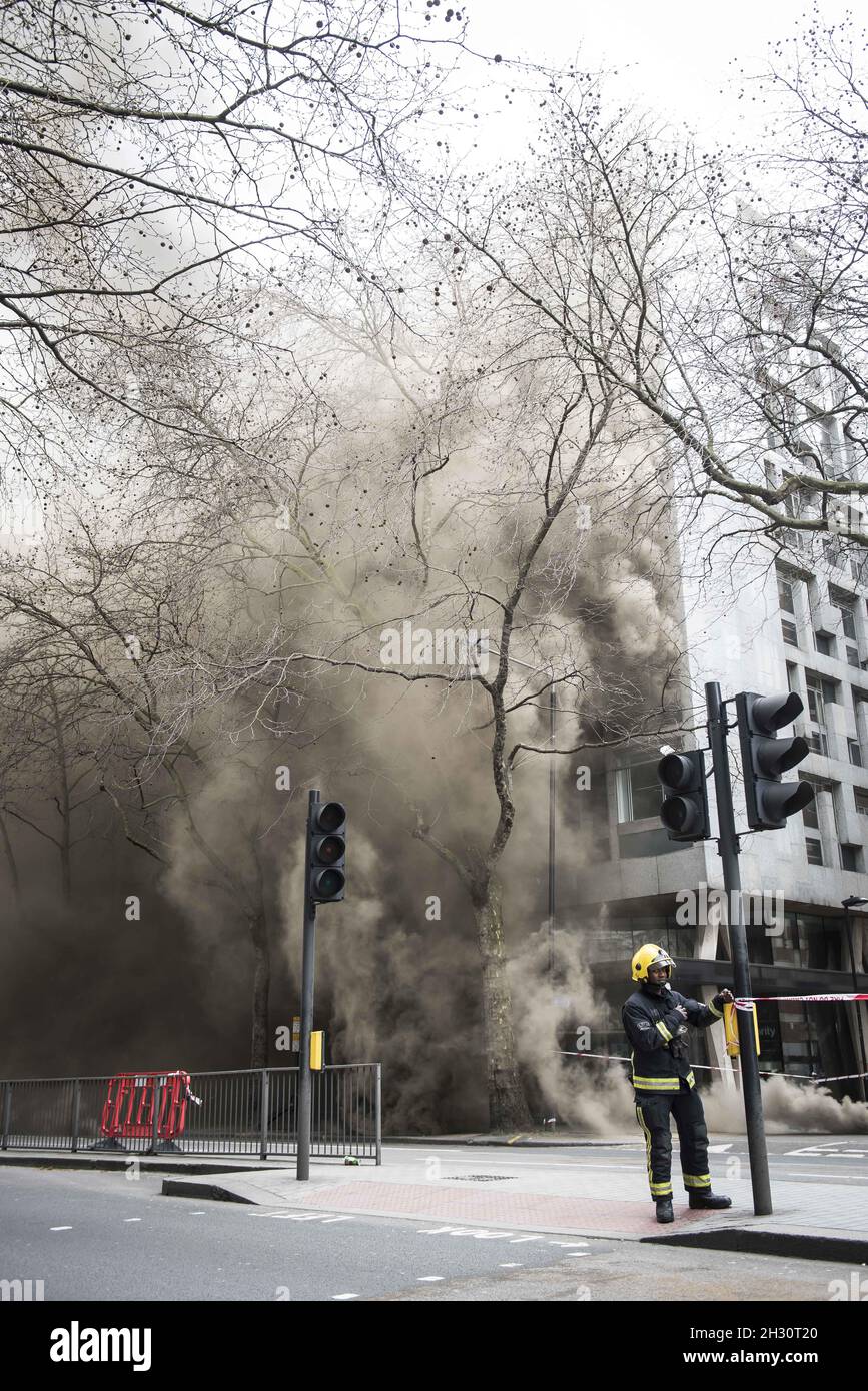 General view of smoke rising from an underground cable fire on Kingsway ...