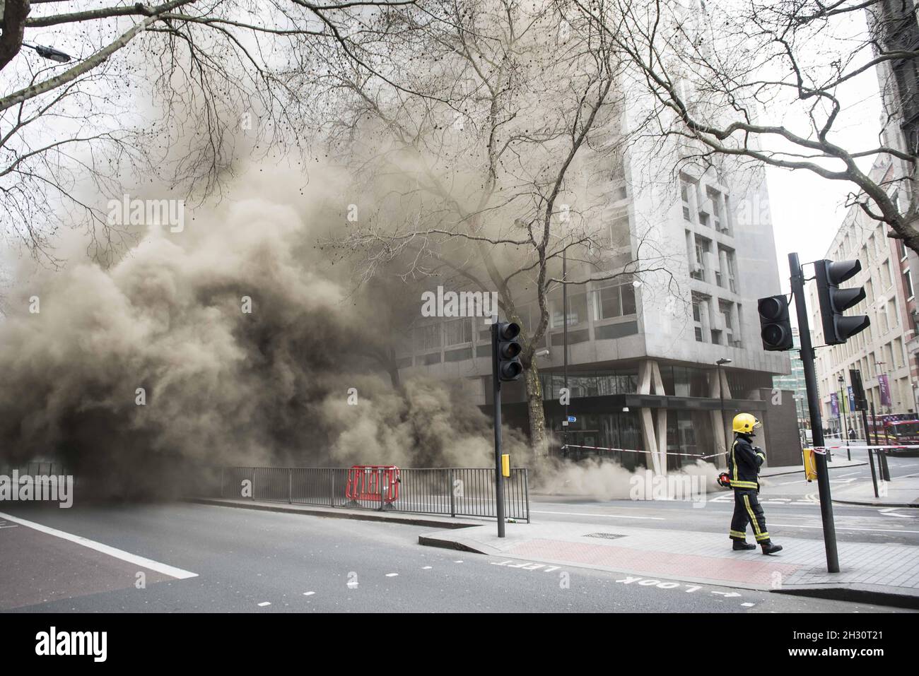 General view of smoke rising from an underground cable fire on Kingsway ...