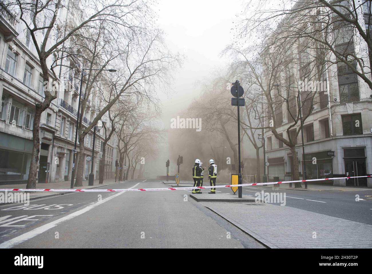 General view of smoke rising from an underground cable fire on an ...