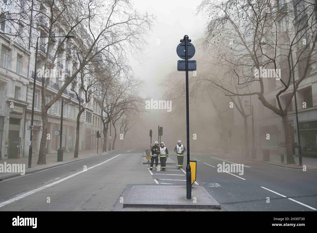General view of smoke rising from an underground cable fire on an ...