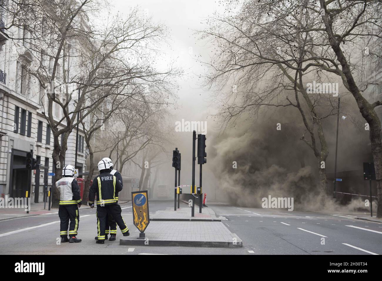General view of smoke rising from an underground cable fire on an ...