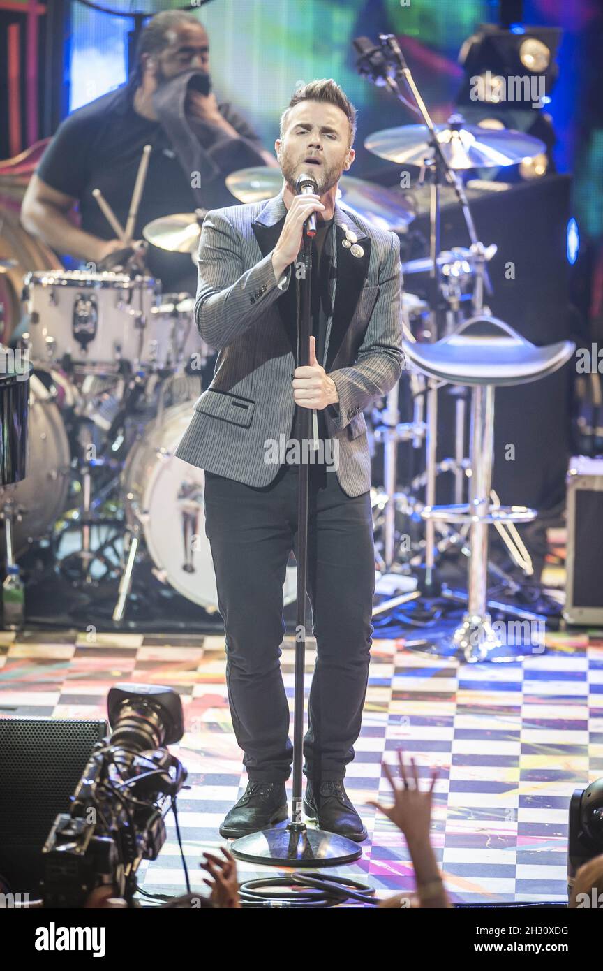 EDITORIAL USE ONLY Gary Barlow of Take That performs live as part of ...