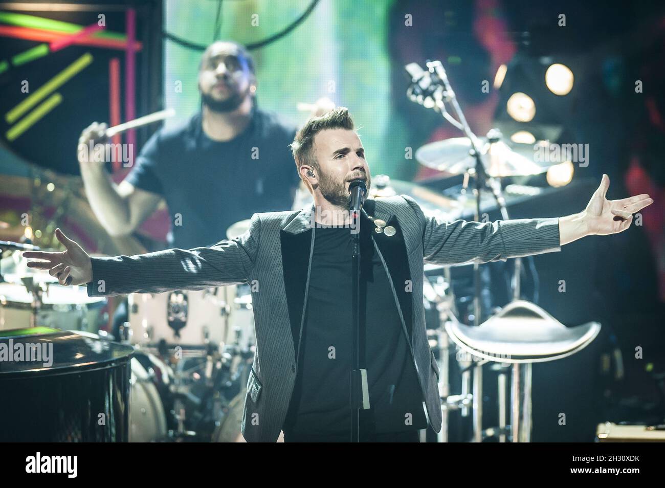 EDITORIAL USE ONLY Gary Barlow of Take That performs live as part of ...