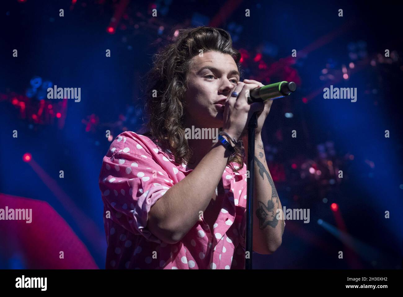 Harry Styles of One Direction performs live on stage as part of the ...