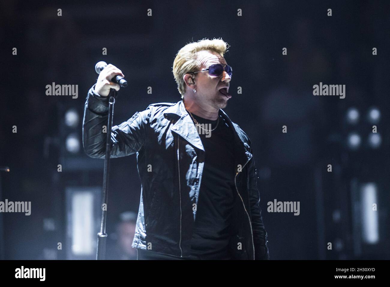Bono of U2 performs live on stage at the O2 arena, Greenwich, London ...