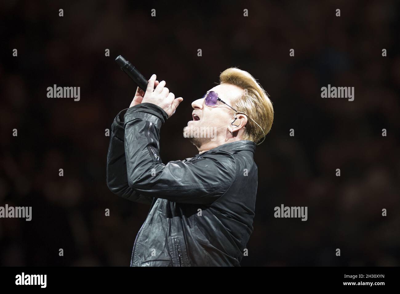 Bono of U2 performs live on stage at the O2 arena, Greenwich, London ...