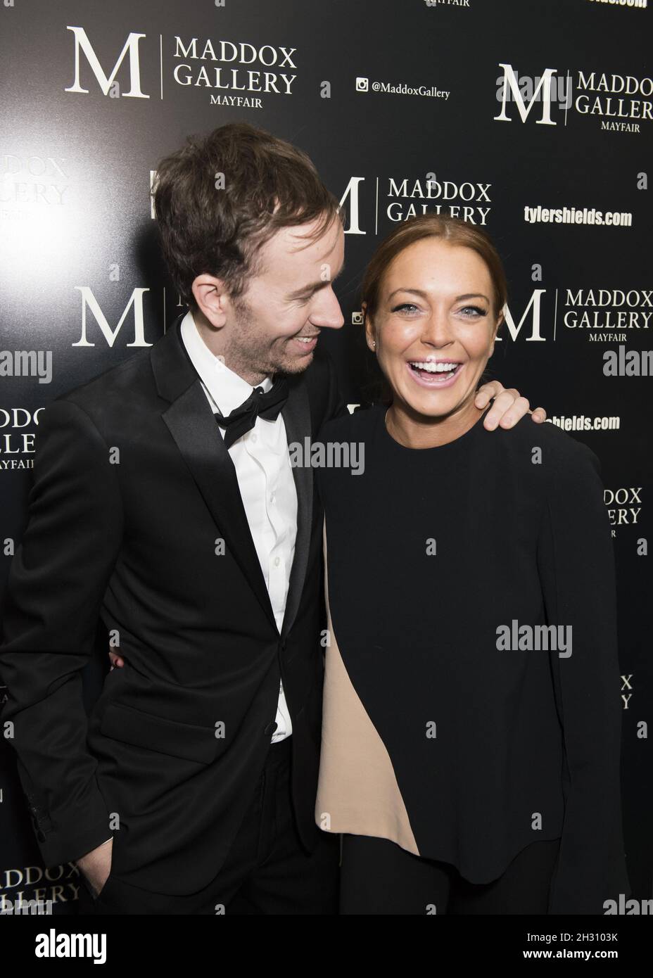Tyler Shields and Lindsay Lohan attend the opening night of Tyler ...