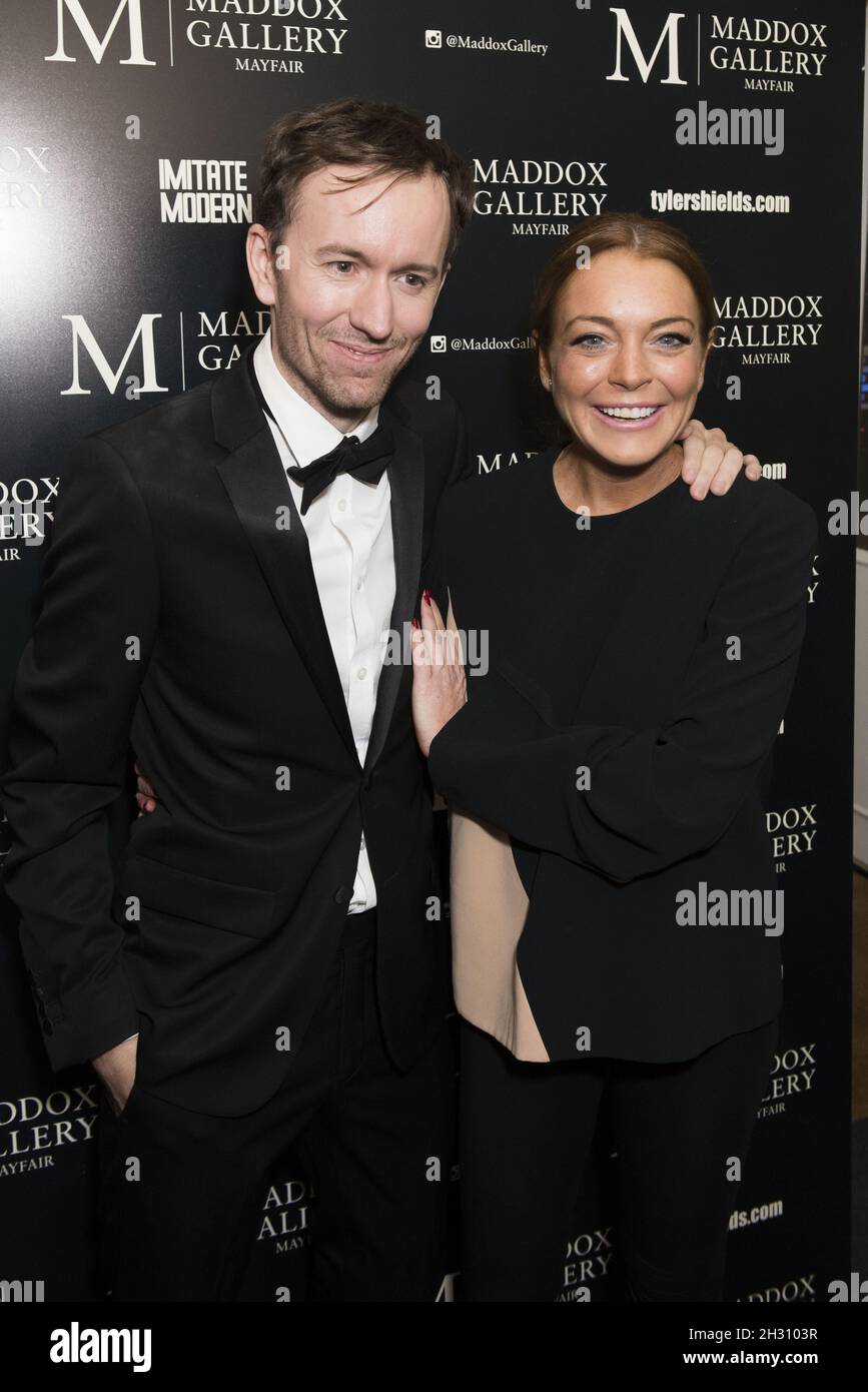 Tyler Shields and Lindsay Lohan attend the opening night of Tyler ...