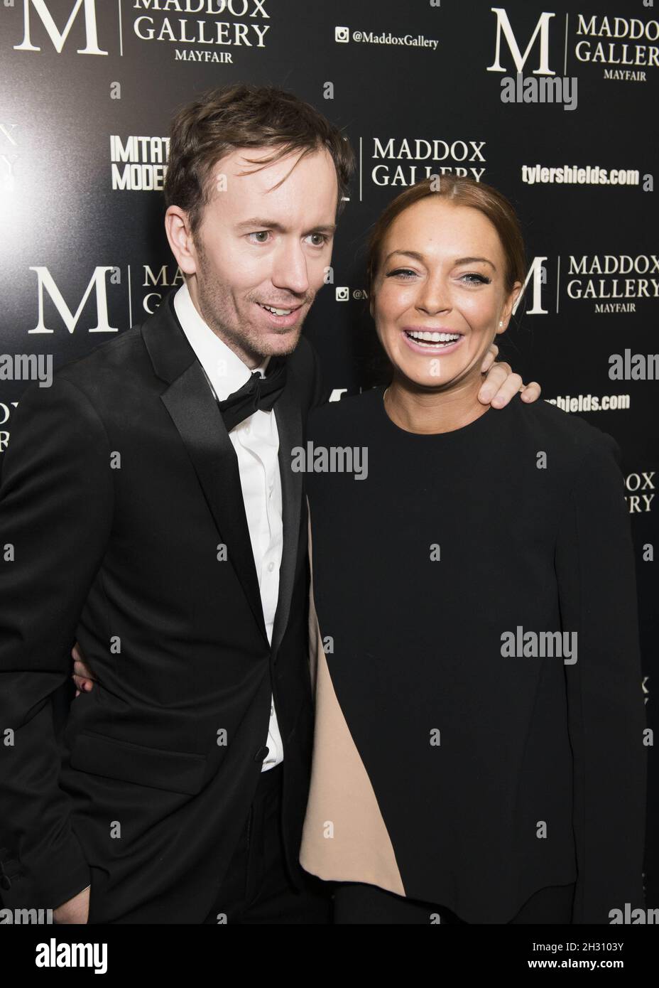 Tyler Shields and Lindsay Lohan attend the opening night of Tyler ...