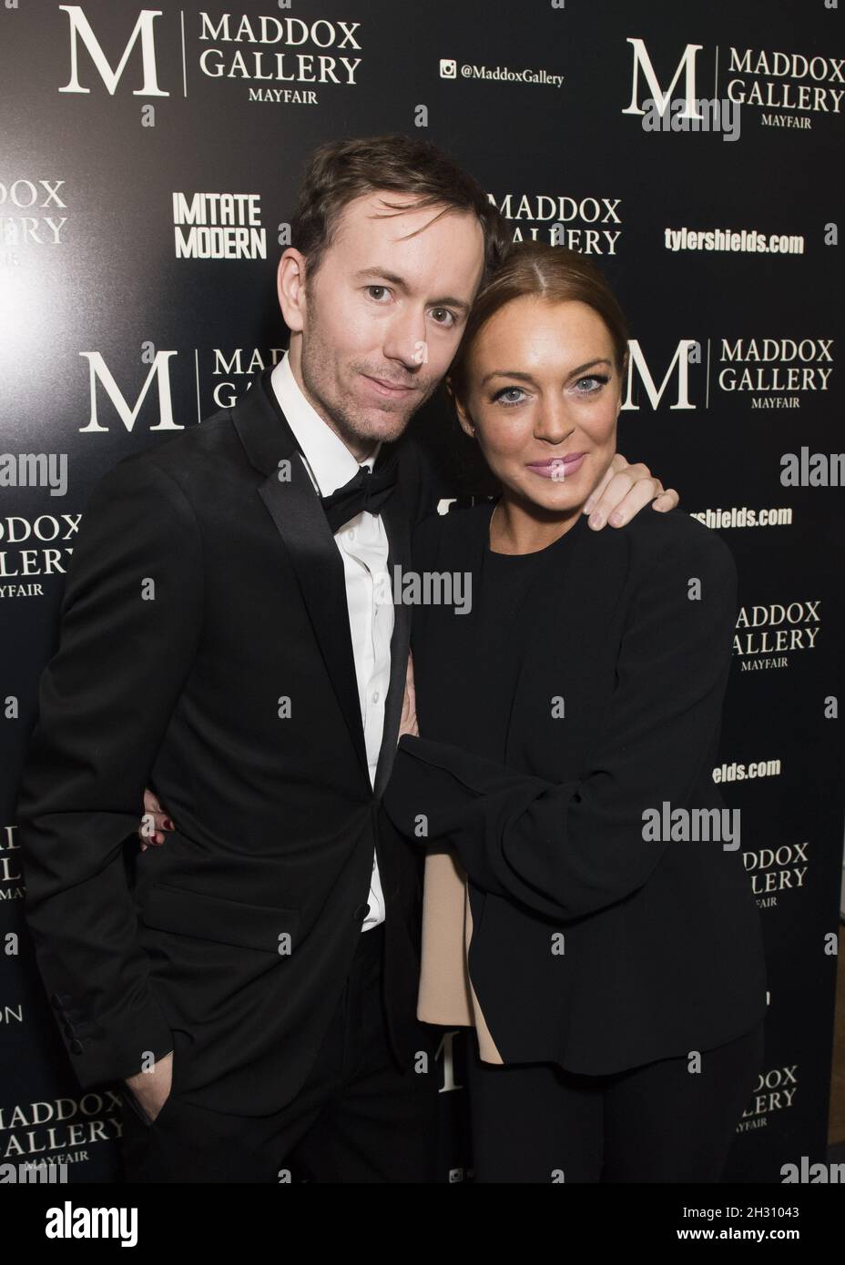 Tyler Shields and Lindsay Lohan attend the opening night of Tyler ...