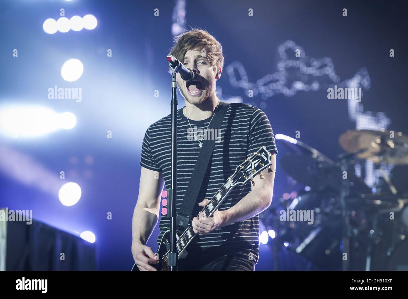 Luke Hemmings of 5 Seconds of Summer on stage at the O2 Arena ...