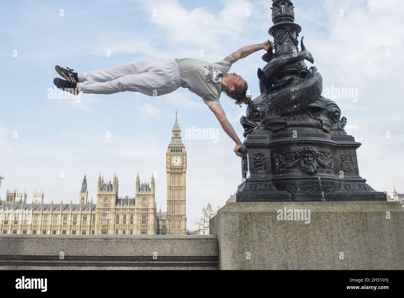 Tim Shieff performs Mowgli inspired Parkour during a photocall in front ...