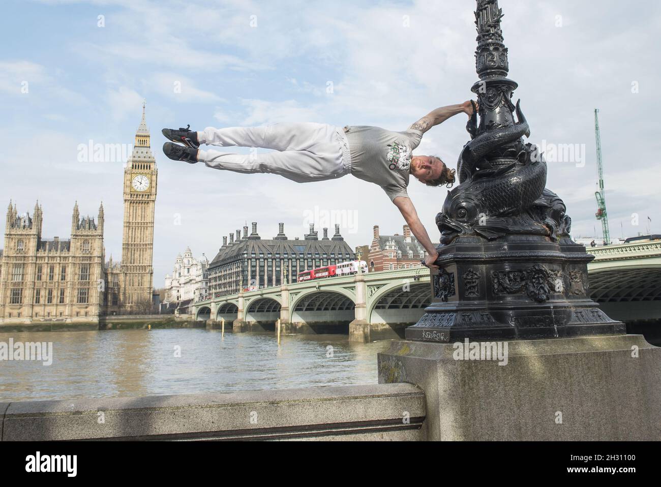 Tim Shieff performs Mowgli inspired Parkour during a photocall in front ...