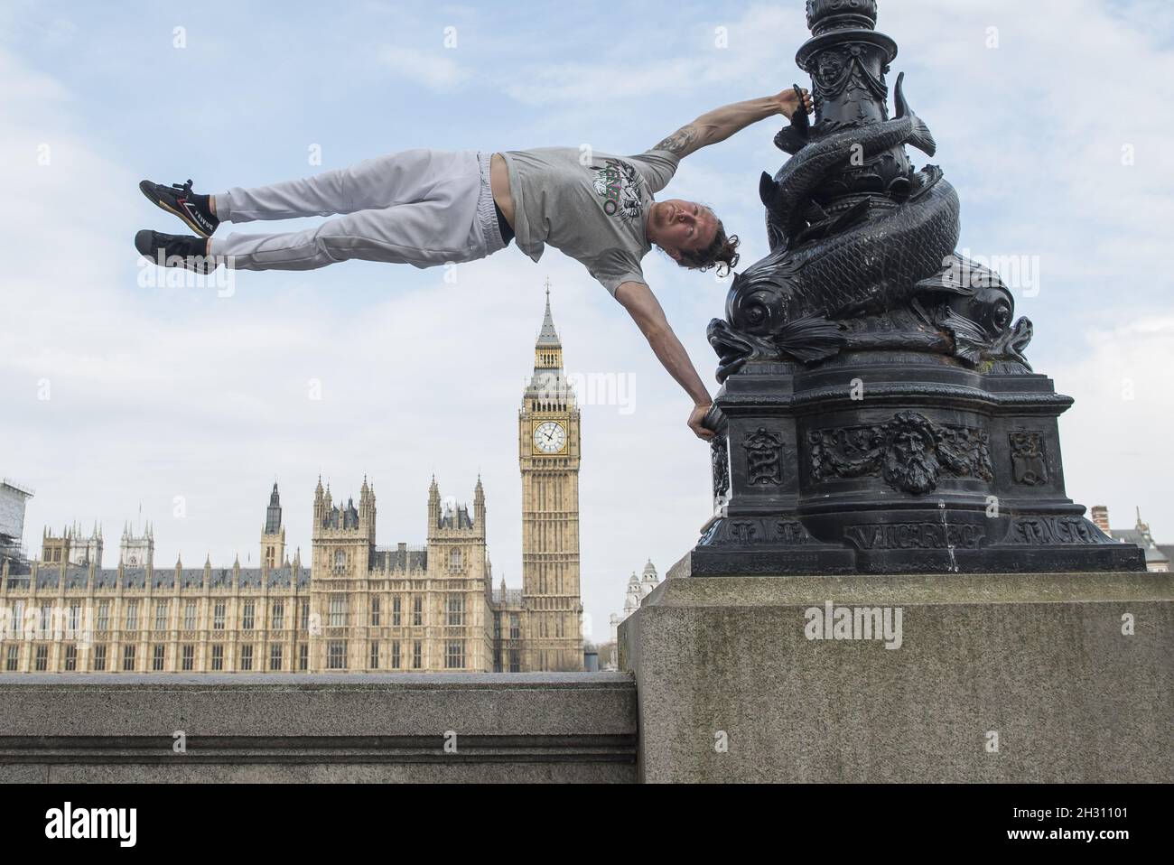 Tim Shieff performs Mowgli inspired Parkour during a photocall in front ...