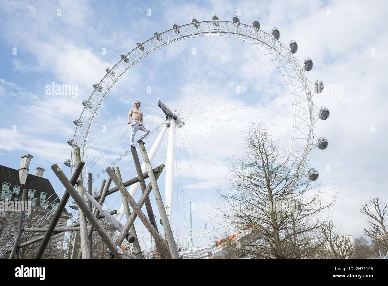 Tim Shieff performs Mowgli inspired Parkour during a photocall in front ...