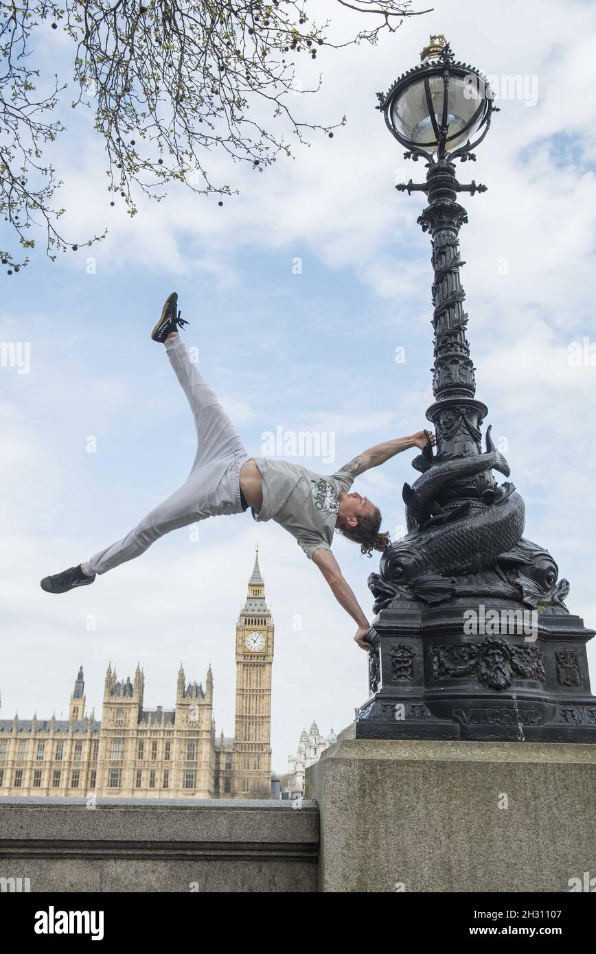 Tim Shieff performs Mowgli inspired Parkour during a photocall in front ...
