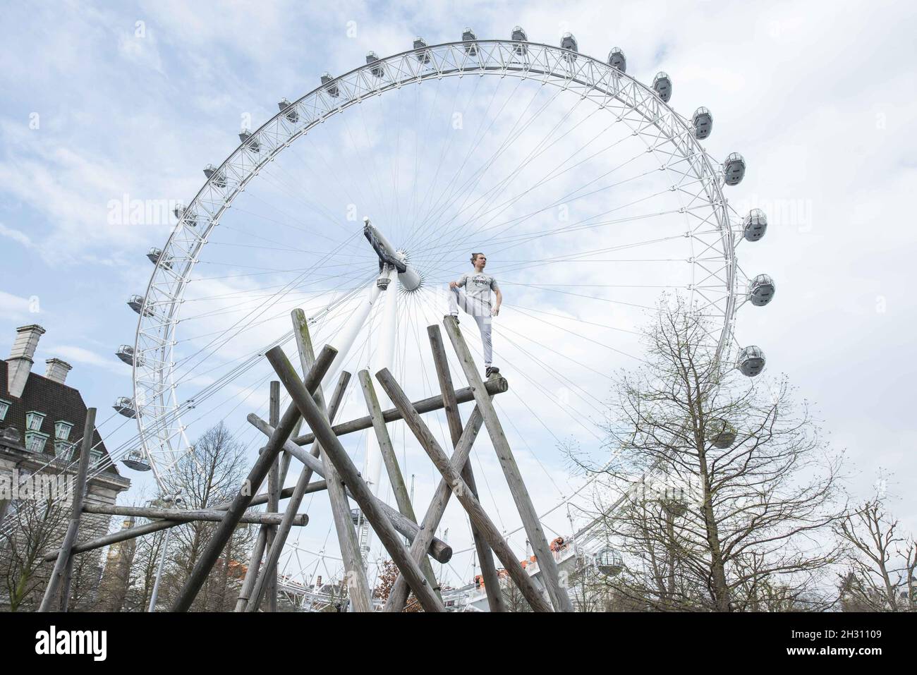 Tim Shieff performs Mowgli inspired Parkour during a photocall in front ...