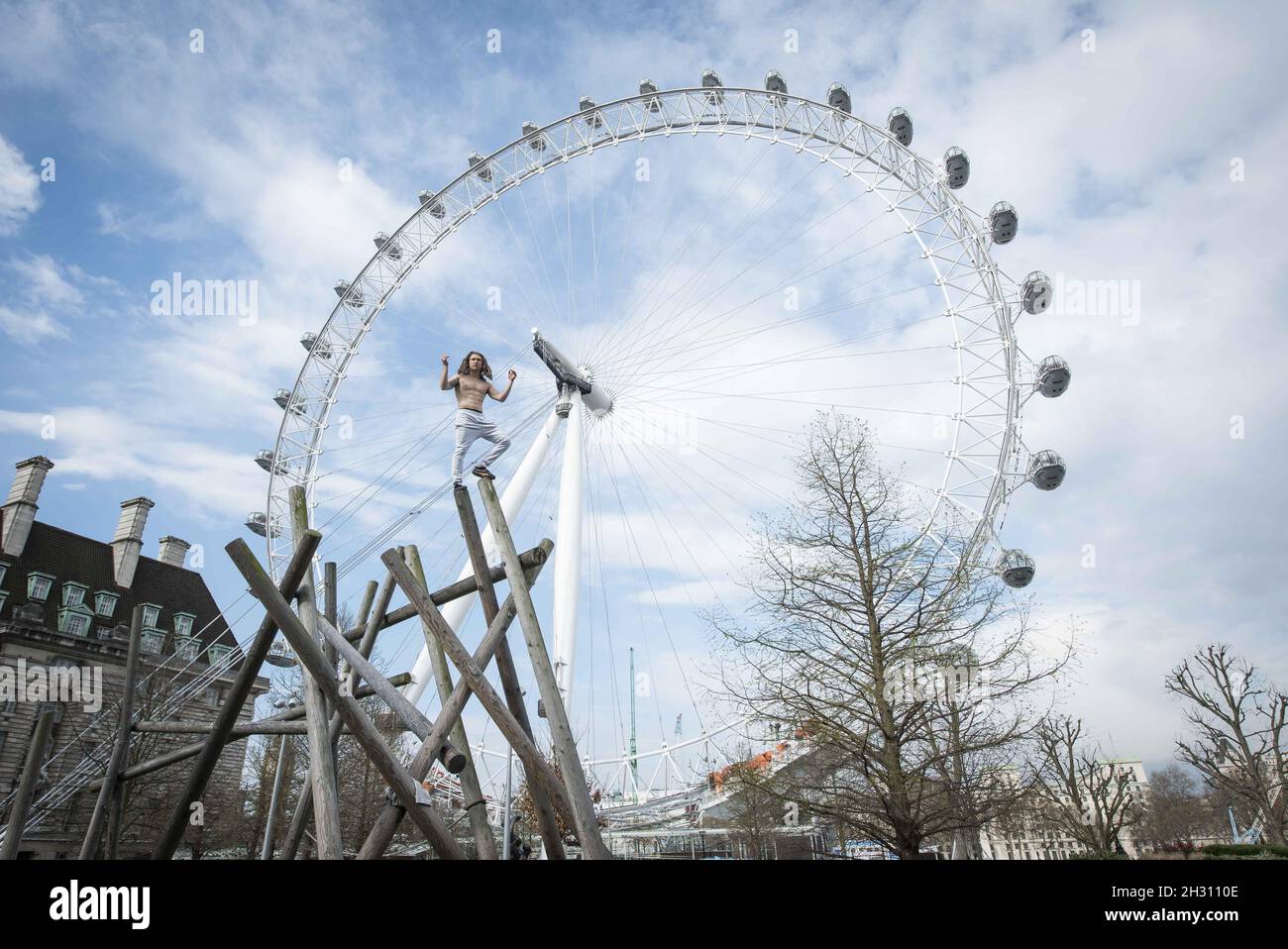 Tim Shieff performs Mowgli inspired Parkour during a photocall in front ...