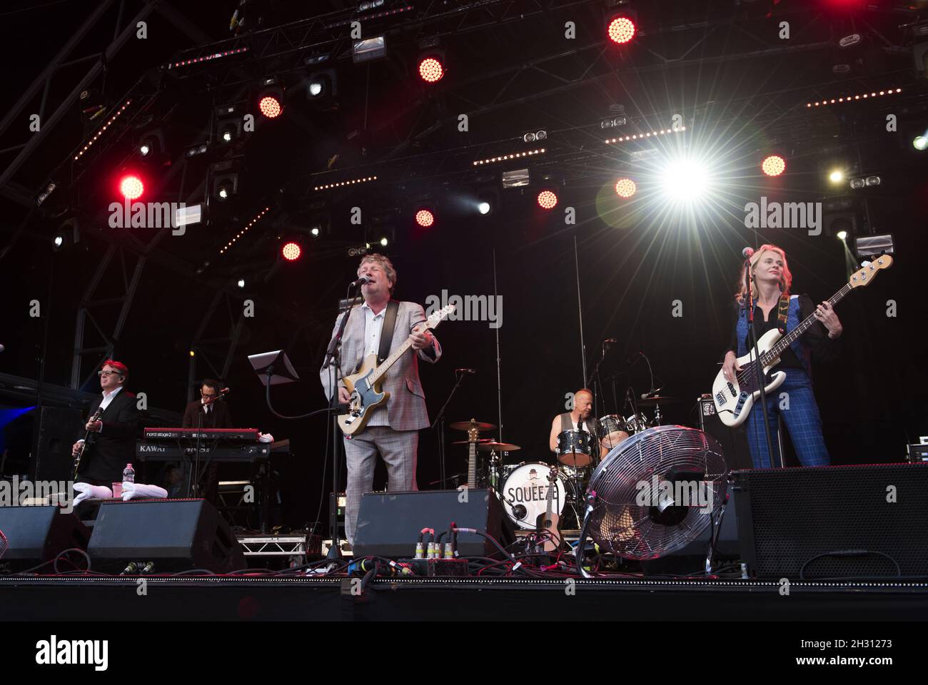 Squeeze perform live on stage at Camp Besitval 2016, Lulworth Castle in Wareham Stock Photo - Alamy