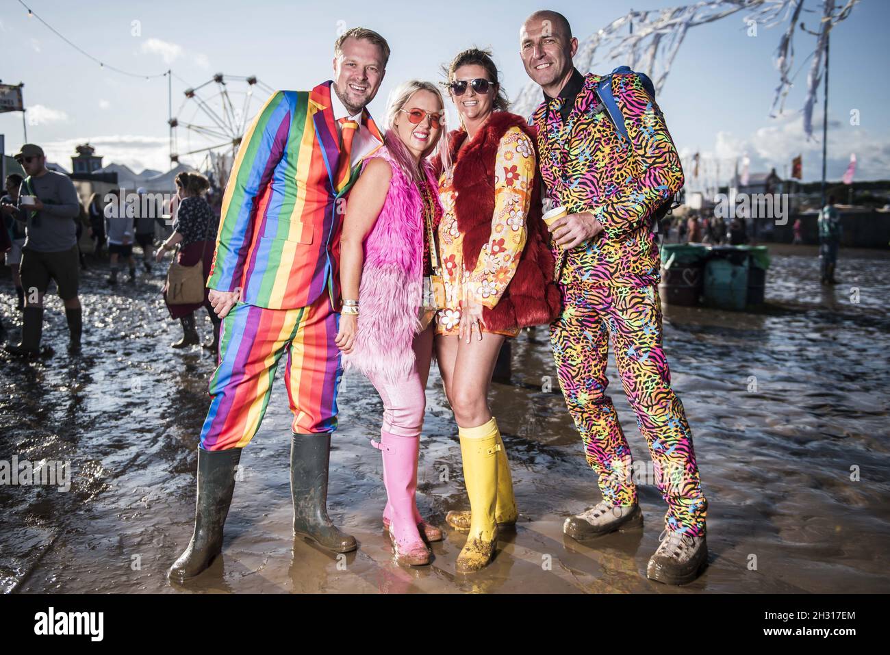 Festival goers in Colour fancy dress at Bestival 2017 at Lulworth ...