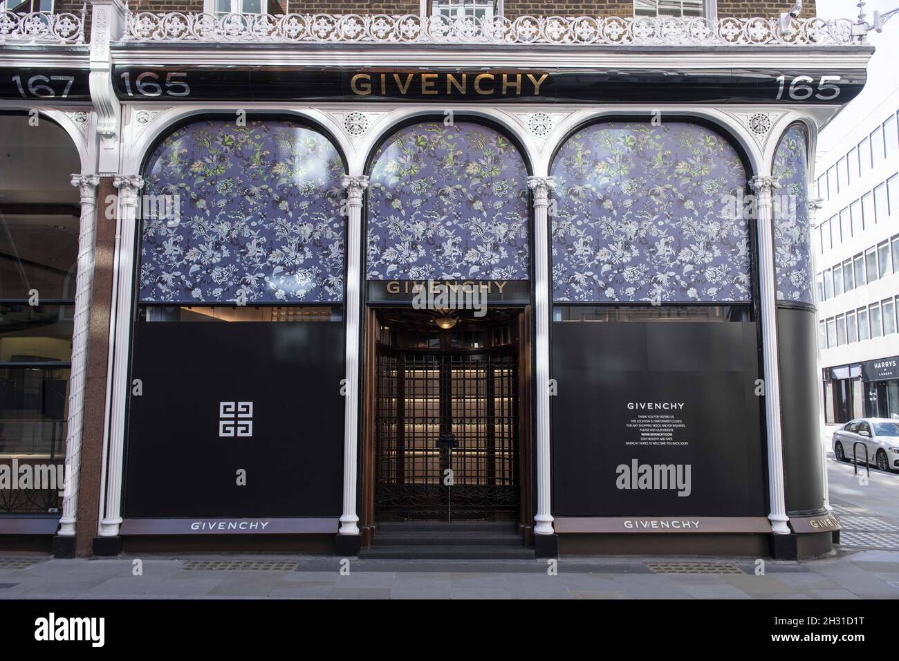 Givenchy board up their shop windows on Bond Street, during the Corona ...