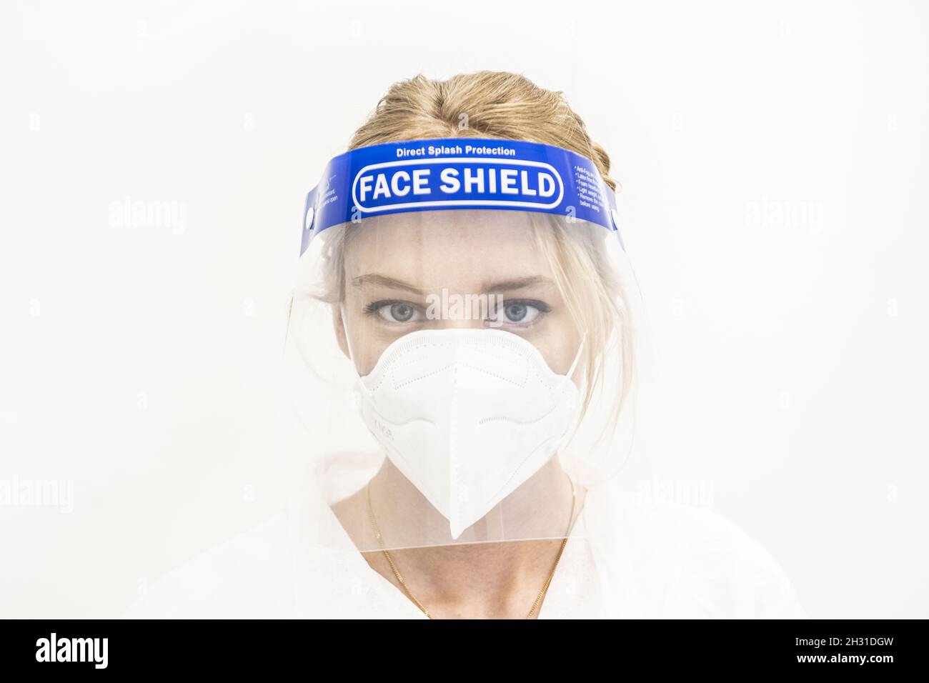 A Dental practice worker wears full PPE as she comes back to work after ...