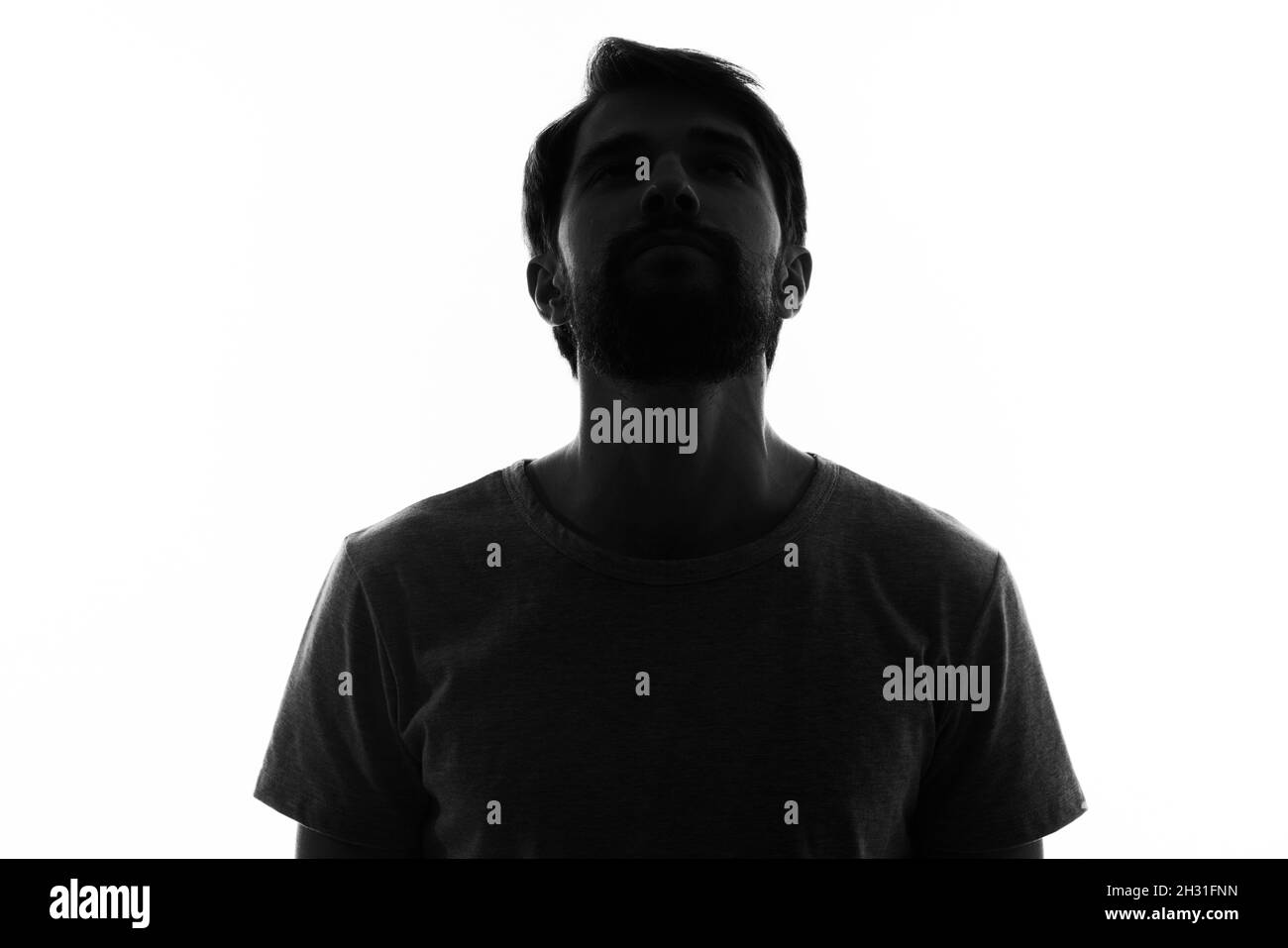 man in the shadows posing studio anonymous Stock Photo - Alamy