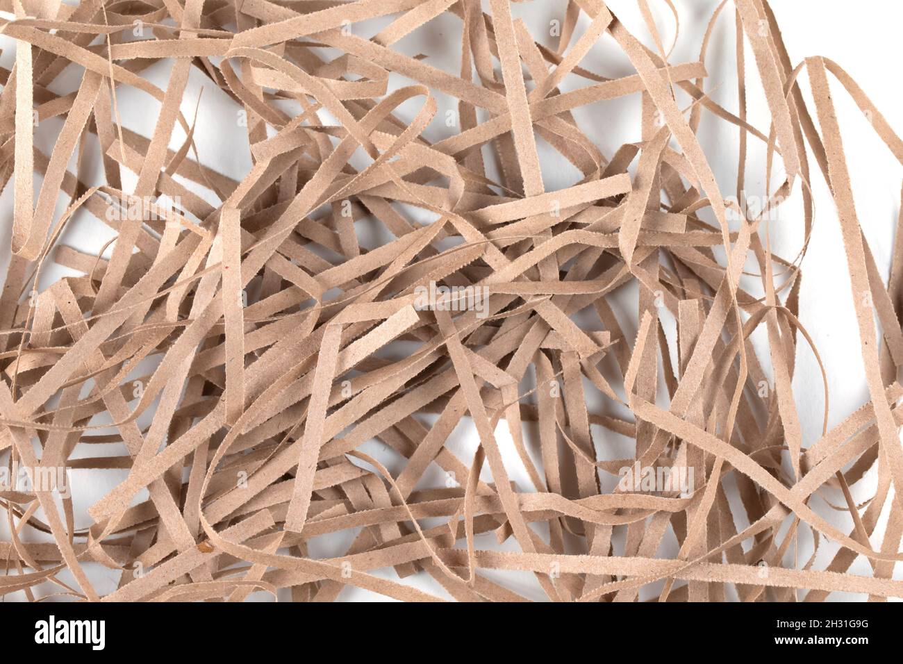 Torn paper strips close-up. A bunch of shredded cardboard Stock Photo ...